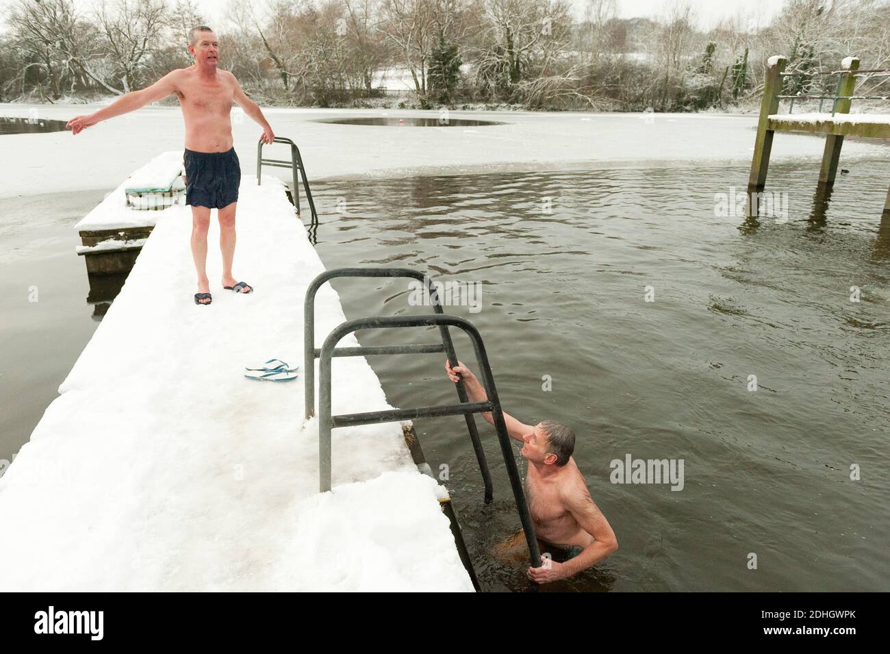 Winter swimmers, braves the snow and ice for their daily swim in ...