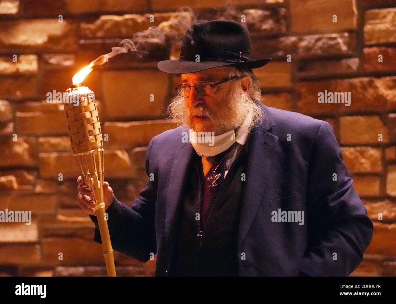 University City, United States. 10th Dec, 2020. Rabbi Yosef Landa holds ...
