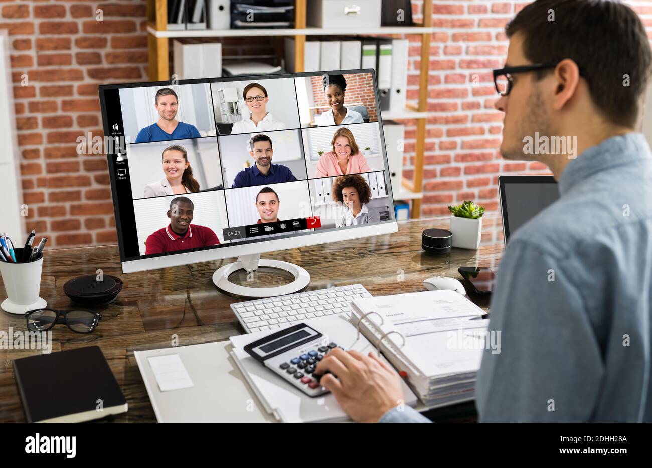 Professional team using video call hi-res stock photography and images ...