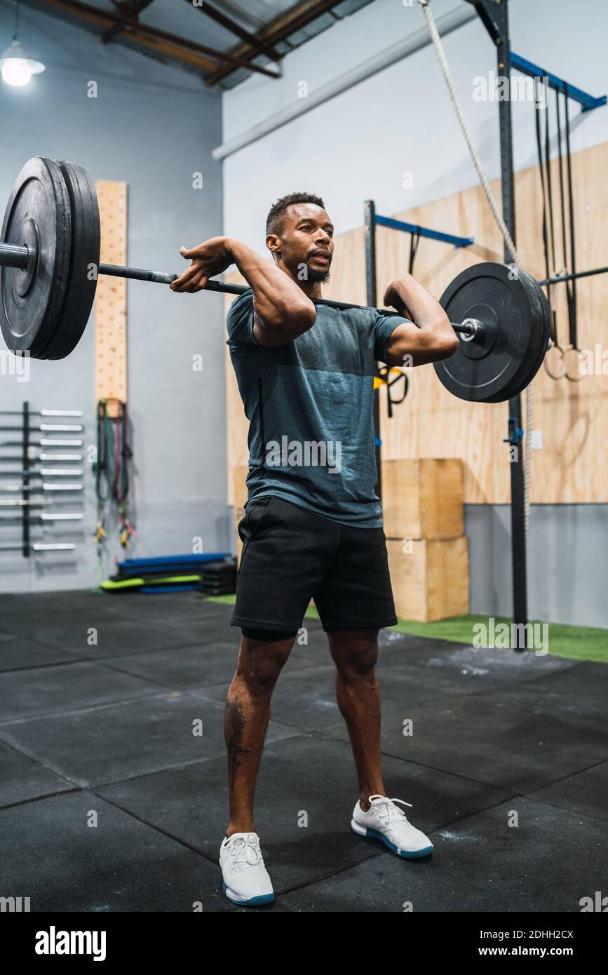 Athlete doing exercise barbell hi-res stock photography and images - Alamy