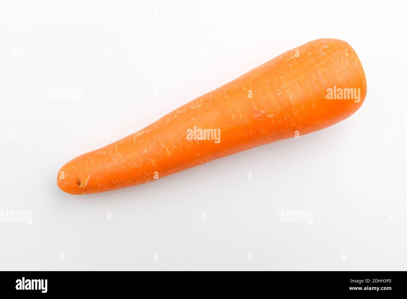 A delicious orange carrot. Elongated carrot Stock Photo - Alamy