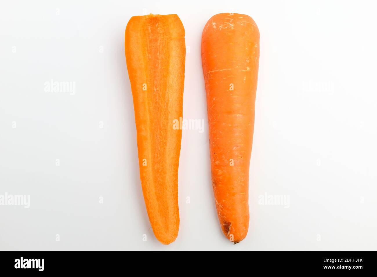 A delicious orange carrot. Elongated carrot Stock Photo - Alamy