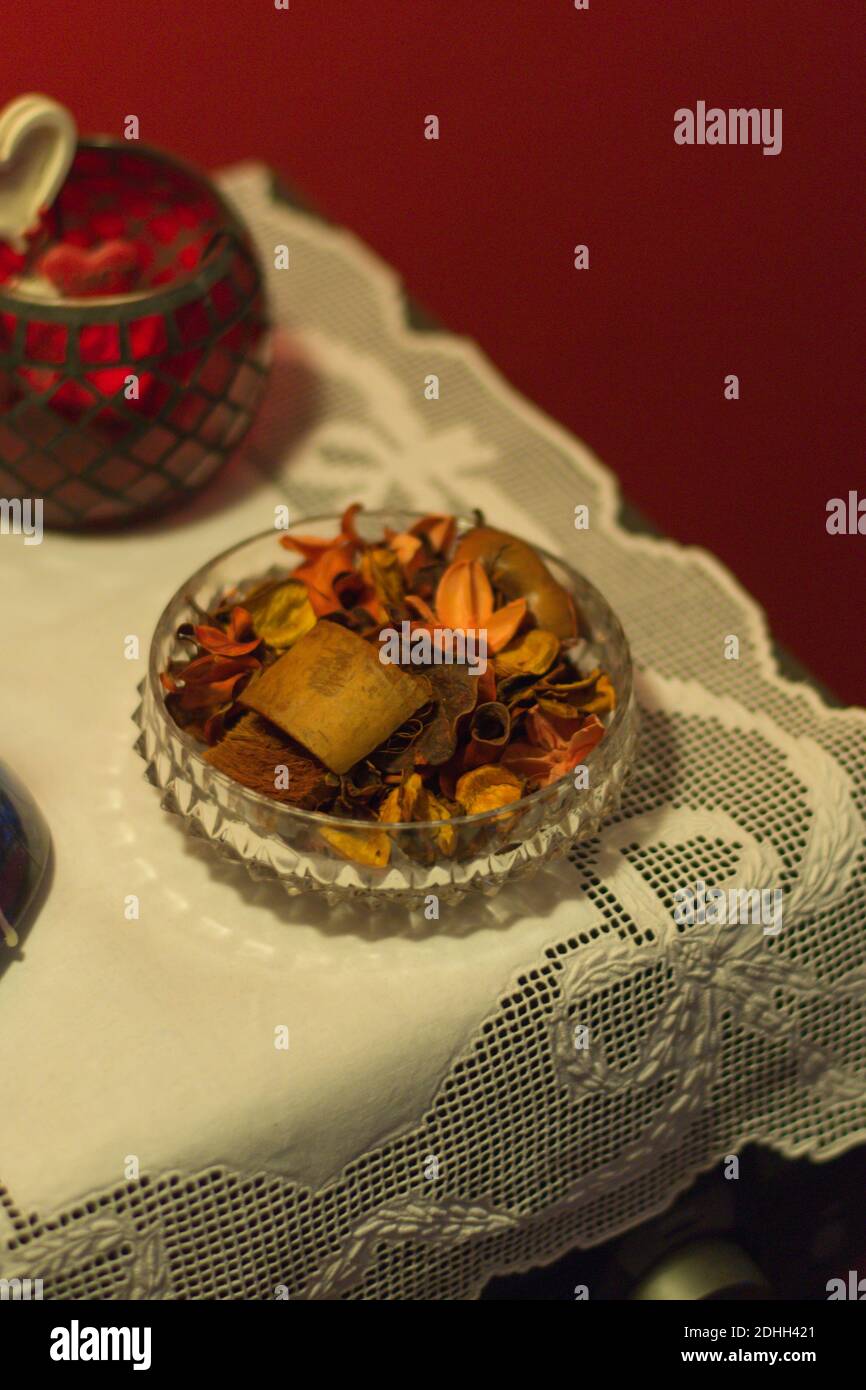 orange potpourri in a pot on desk Stock Photo - Alamy