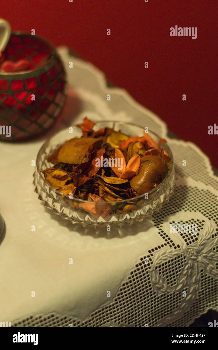 orange potpourri in a pot on desk Stock Photo - Alamy