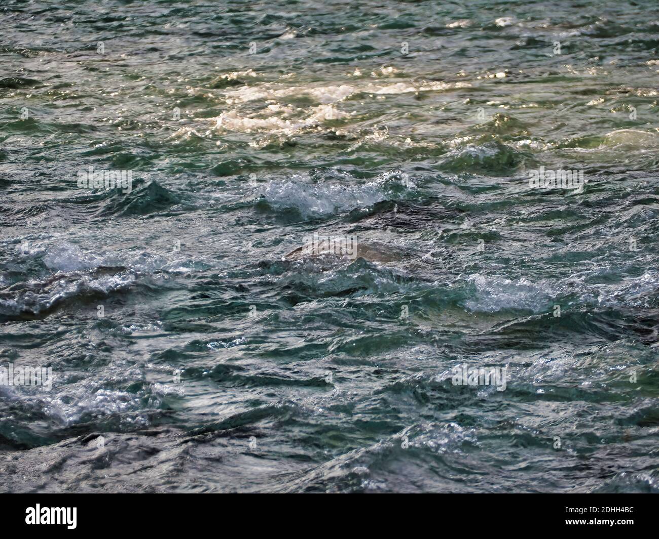 A high angle shot of the water flowing in the river Stock Photo - Alamy