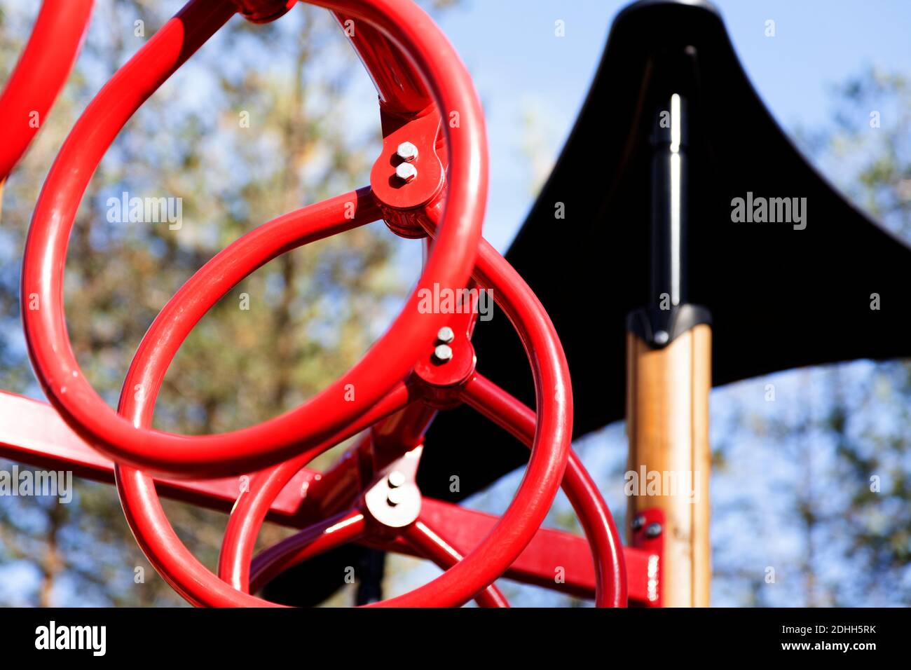red monkey bars at playground Stock Photo - Alamy