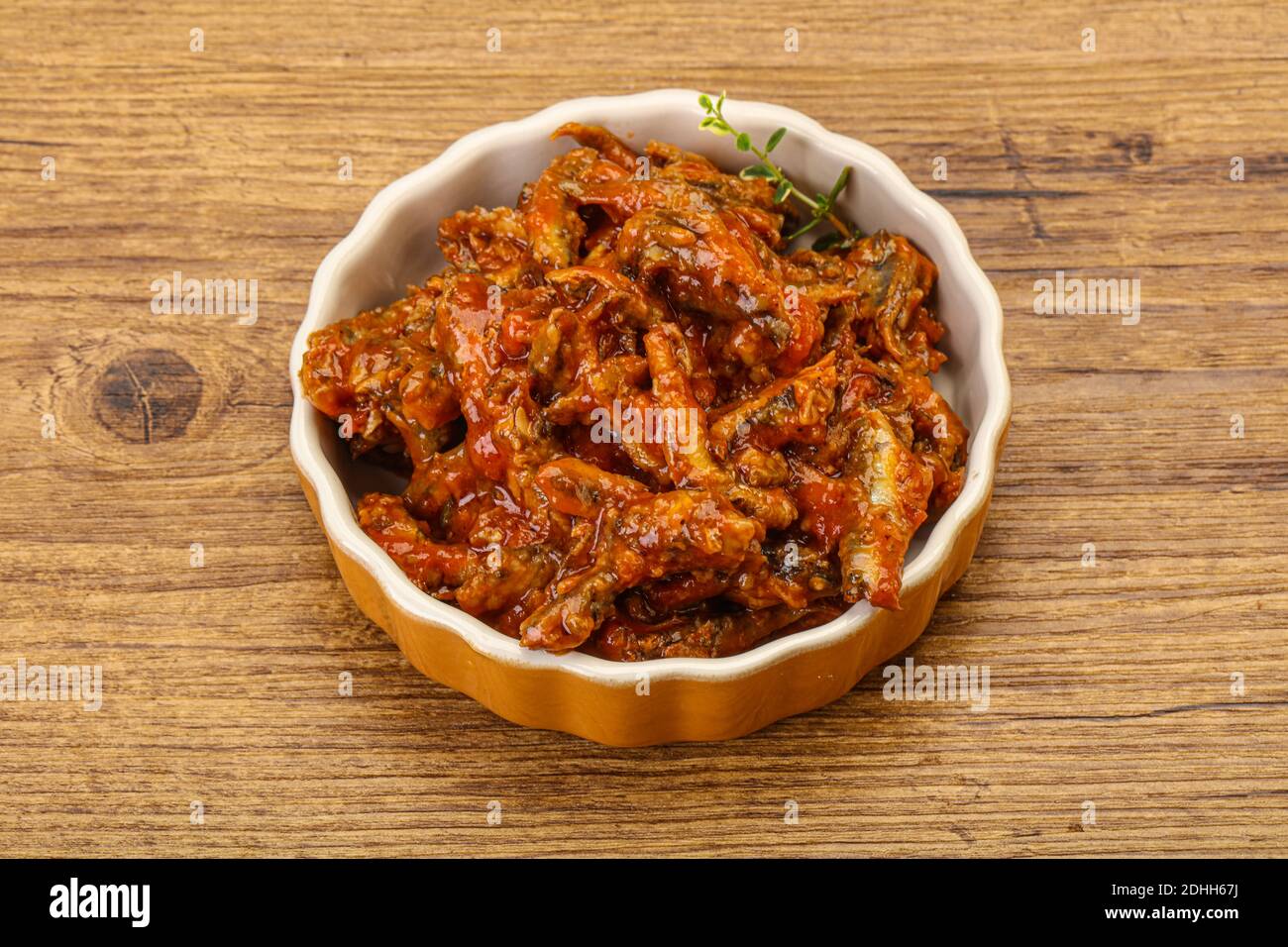 Canned anchovy snack in tomato sauce Stock Photo - Alamy