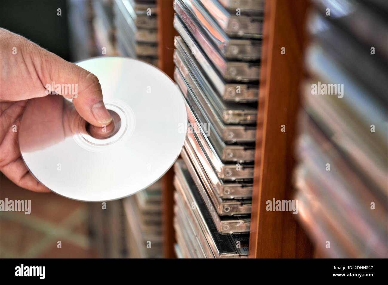 hand holding cd Stock Photo - Alamy