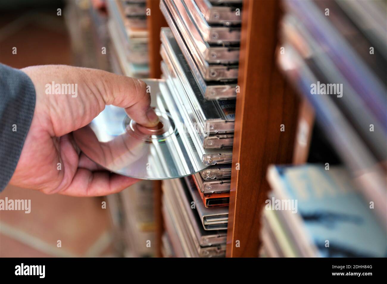 hand holding cd Stock Photo - Alamy