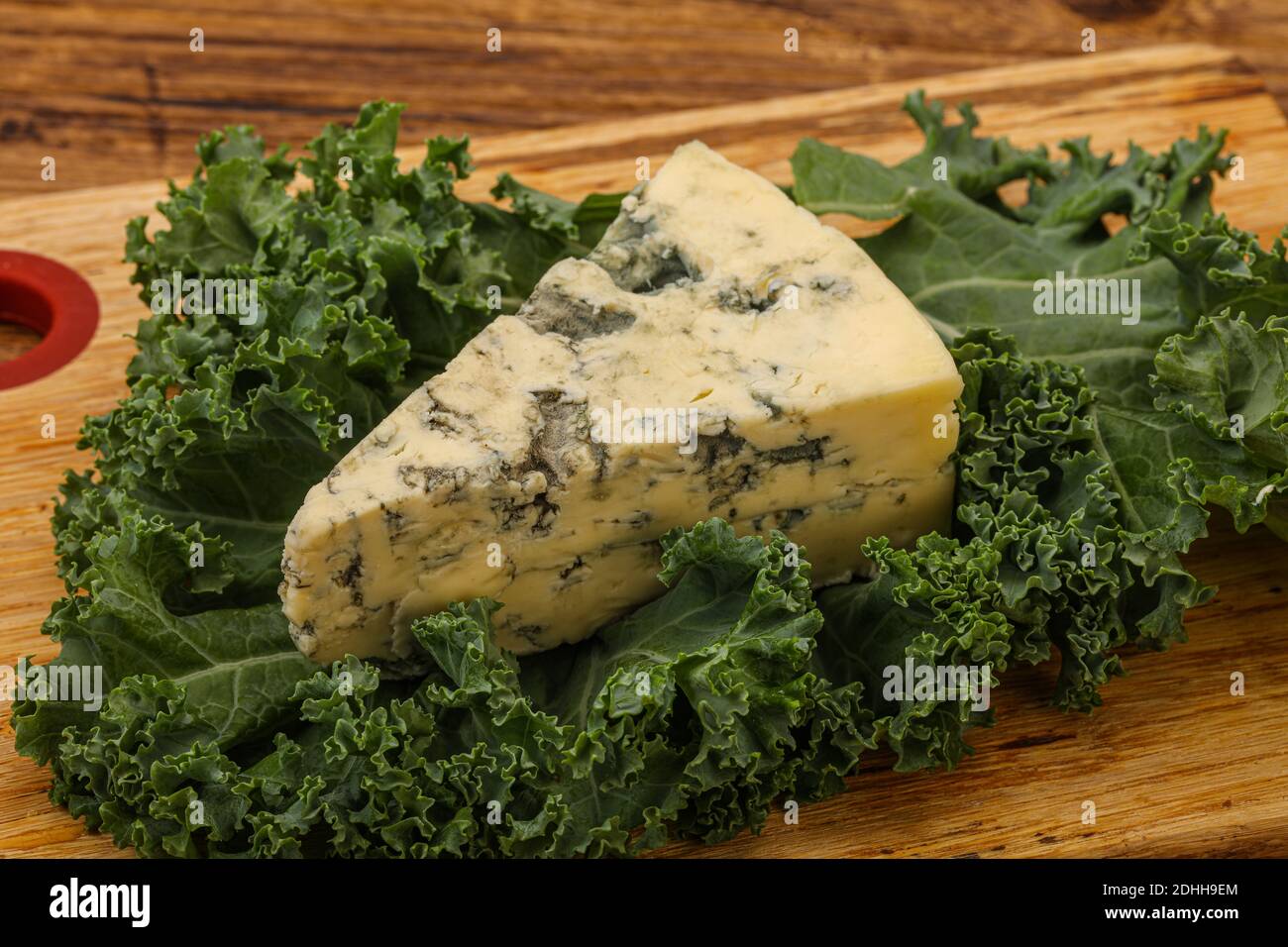 Dairy Blue cheese triangle with mold Stock Photo - Alamy