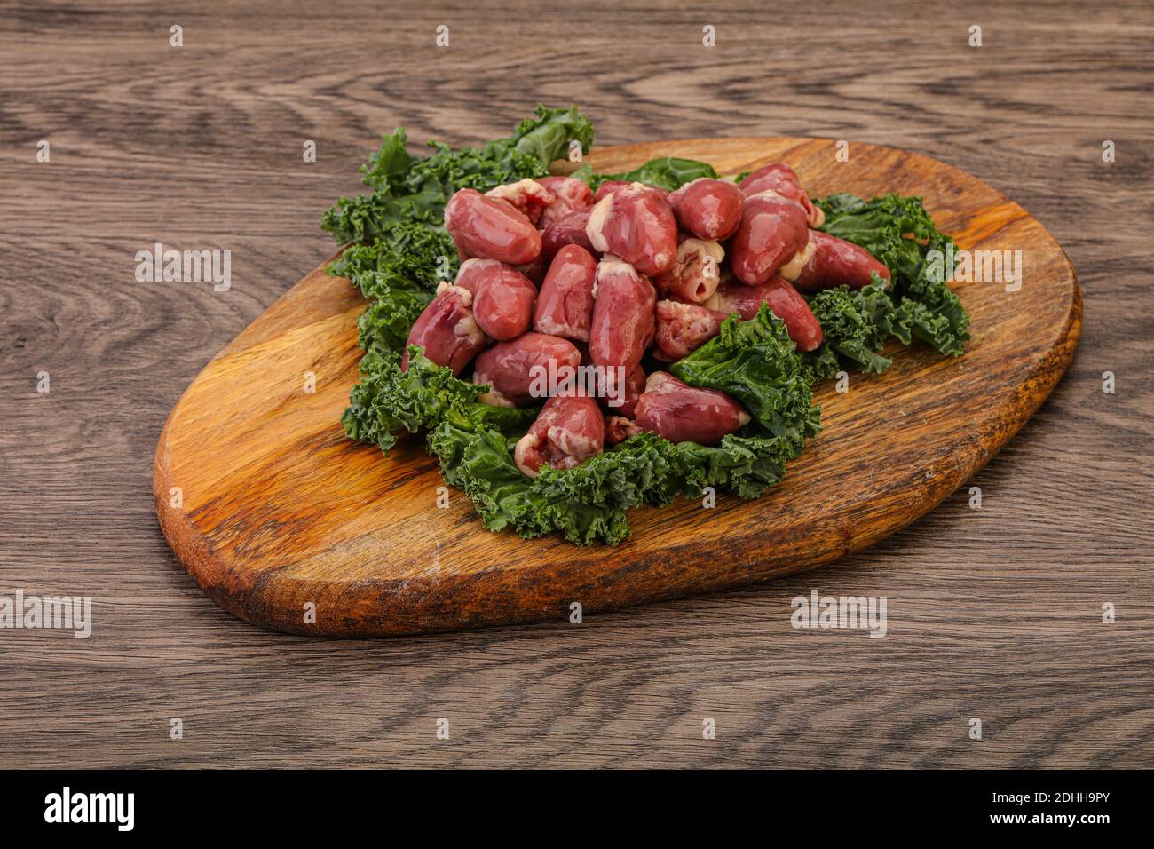 Raw chicken hearts heap for cooking Stock Photo - Alamy
