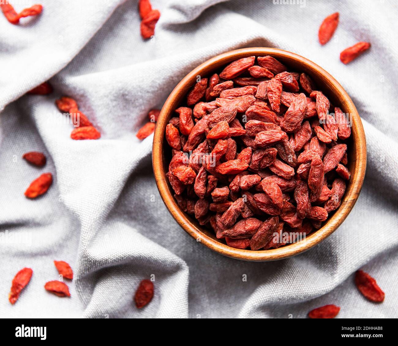 Dry red goji berries for a healthy diet on a fabric background Stock ...