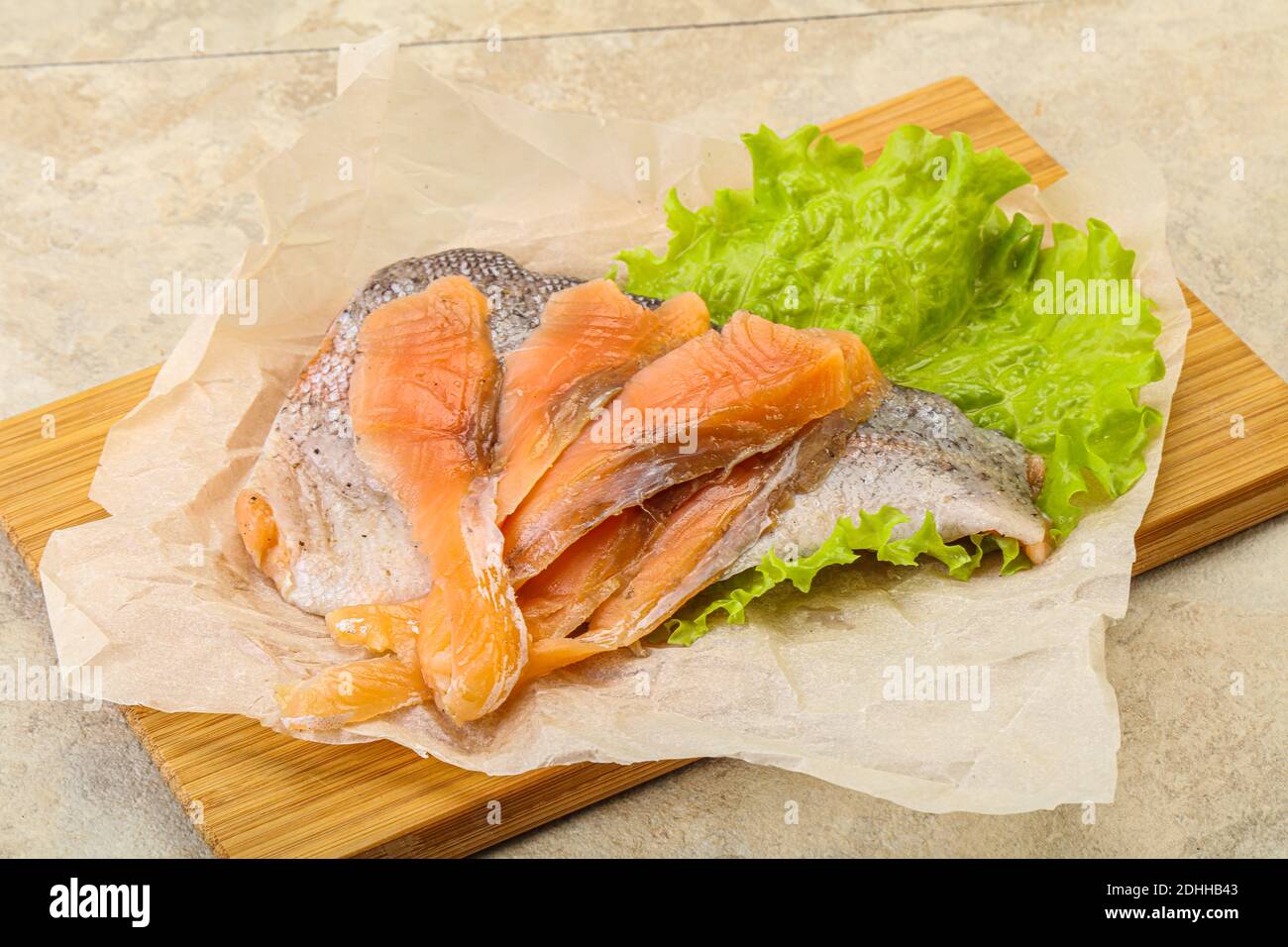 Sliced natural wild trout fillet over board Stock Photo - Alamy