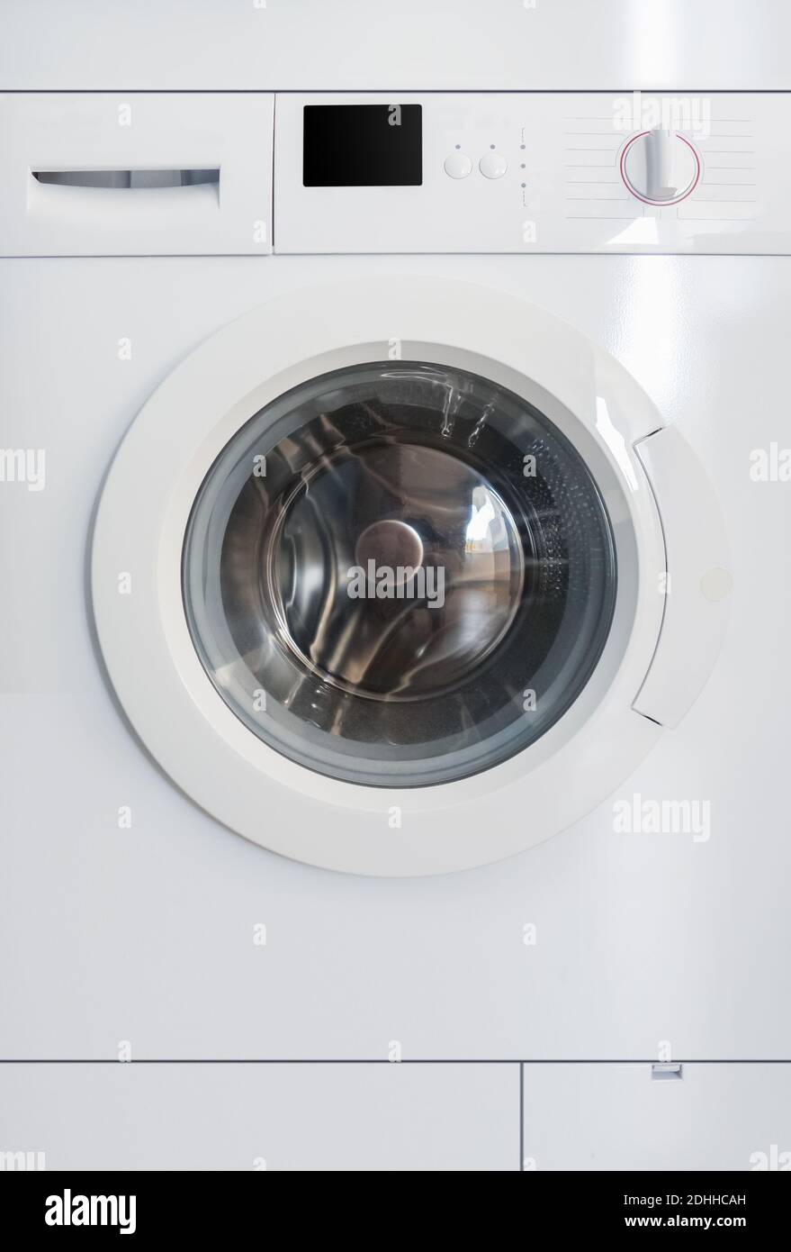 Washing machine front view - Full screen background Stock Photo - Alamy