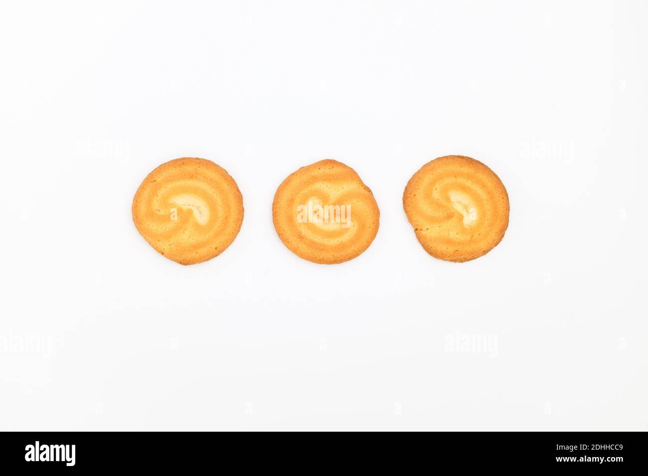 Butter-flavored cookies on white background Stock Photo - Alamy