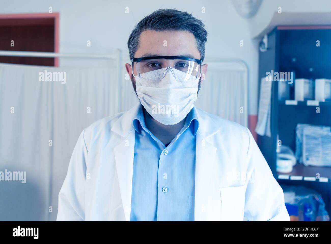 Scientist with glasses looking at the camera Stock Photo - Alamy