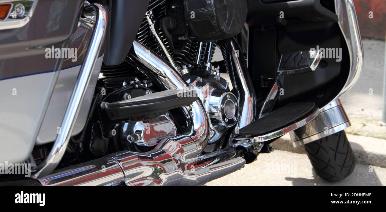 an engine block with exhaust from a motorcycle Stock Photo - Alamy