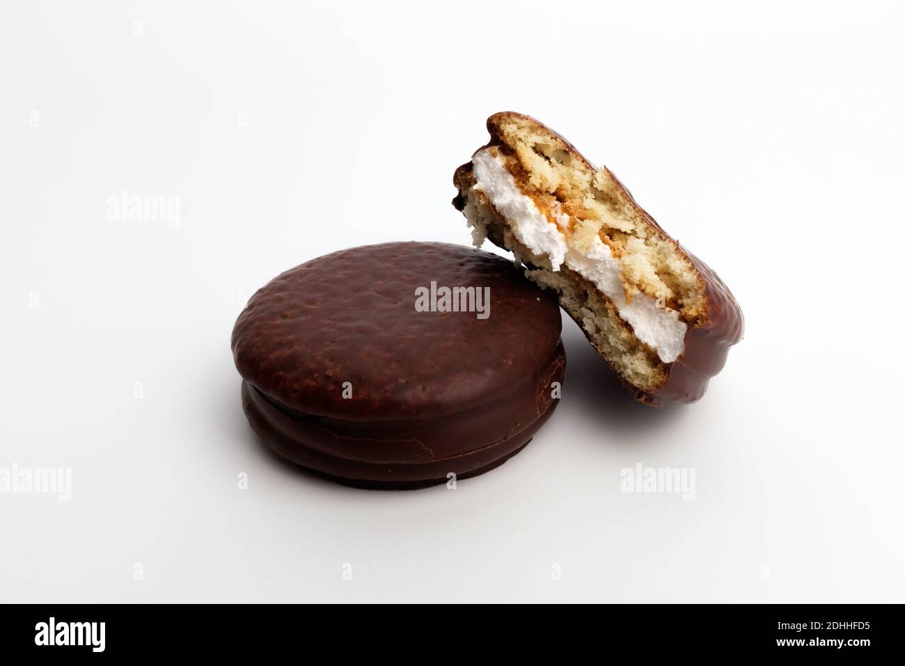 Chocolate coated pie on white background Stock Photo - Alamy