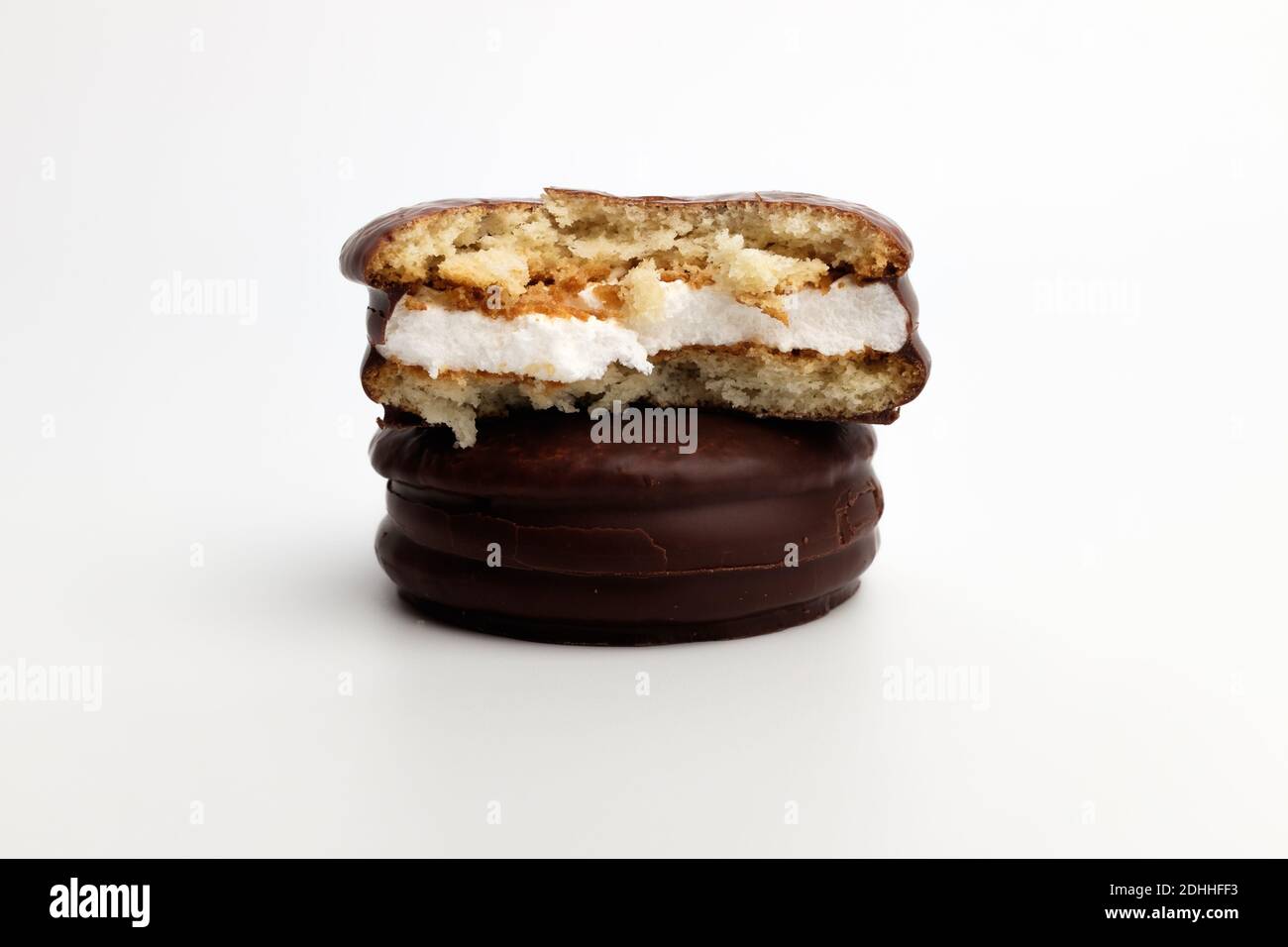 Chocolate coated pie on white background Stock Photo - Alamy