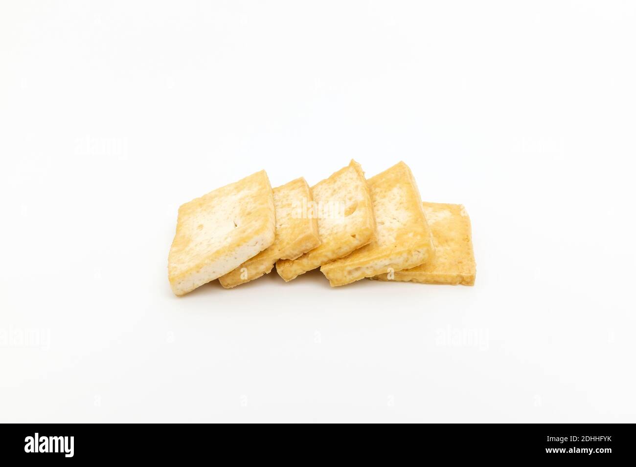 Grilled tofu on white background Stock Photo - Alamy