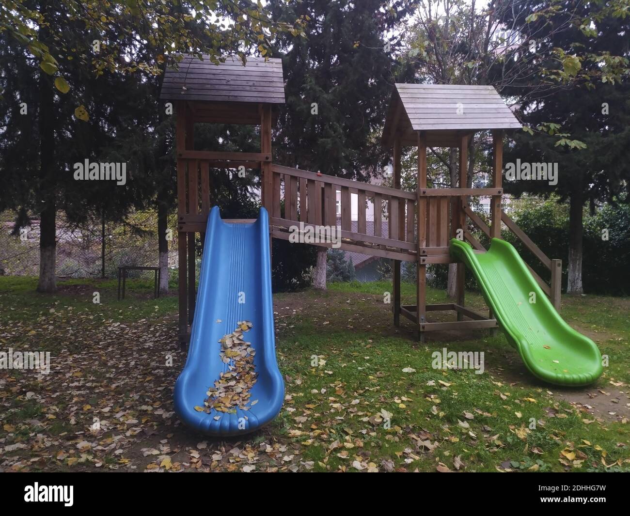 A view of playground slide in a park Stock Photo - Alamy
