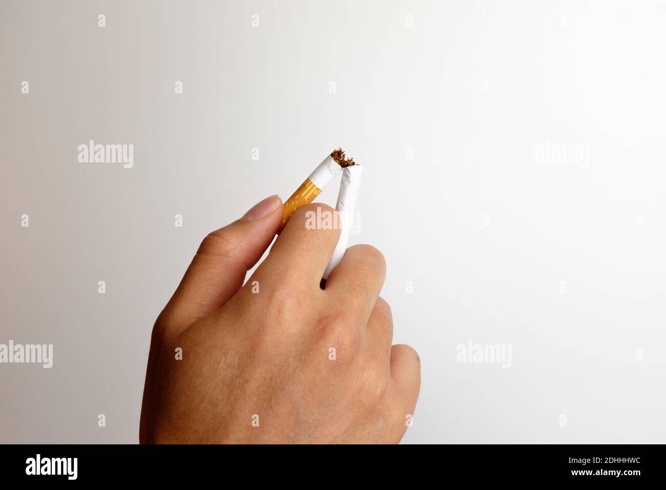 Short cigarette on white background Stock Photo - Alamy