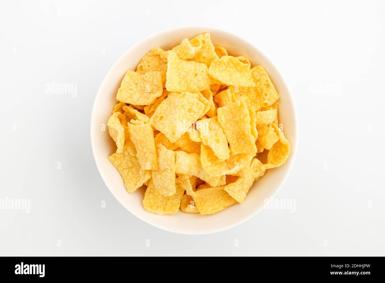 Chips made of corn on a white background Stock Photo - Alamy