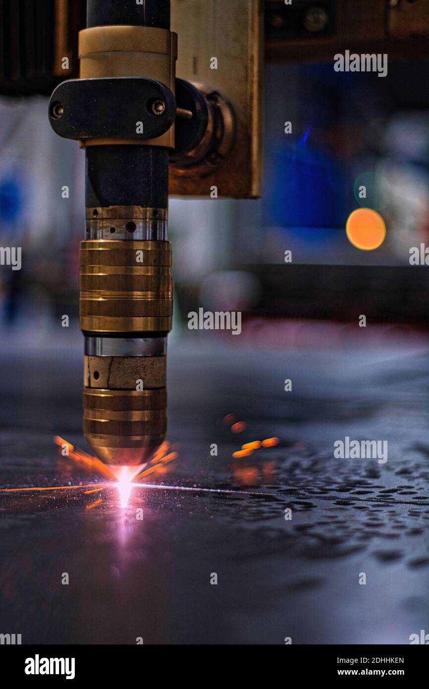 A vertical shot of the professional laser cutter in the factory Stock ...