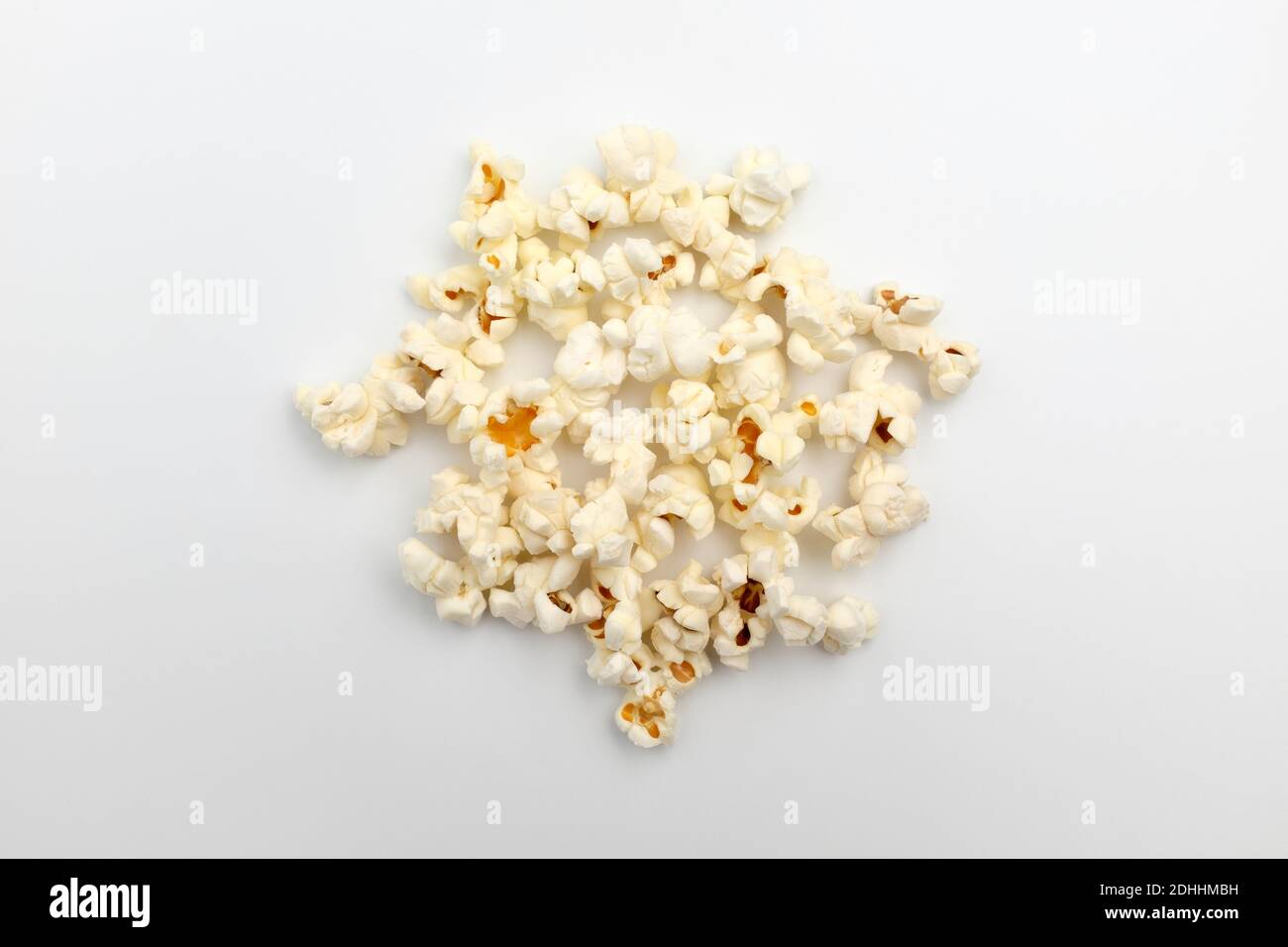 Popcorn made of corn on white background Stock Photo - Alamy