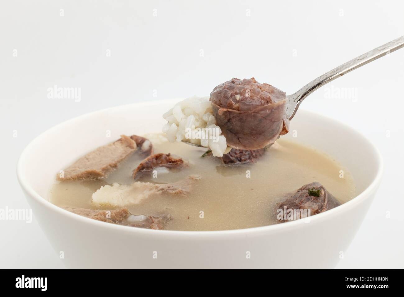 Pork intestine soup on white background Stock Photo - Alamy