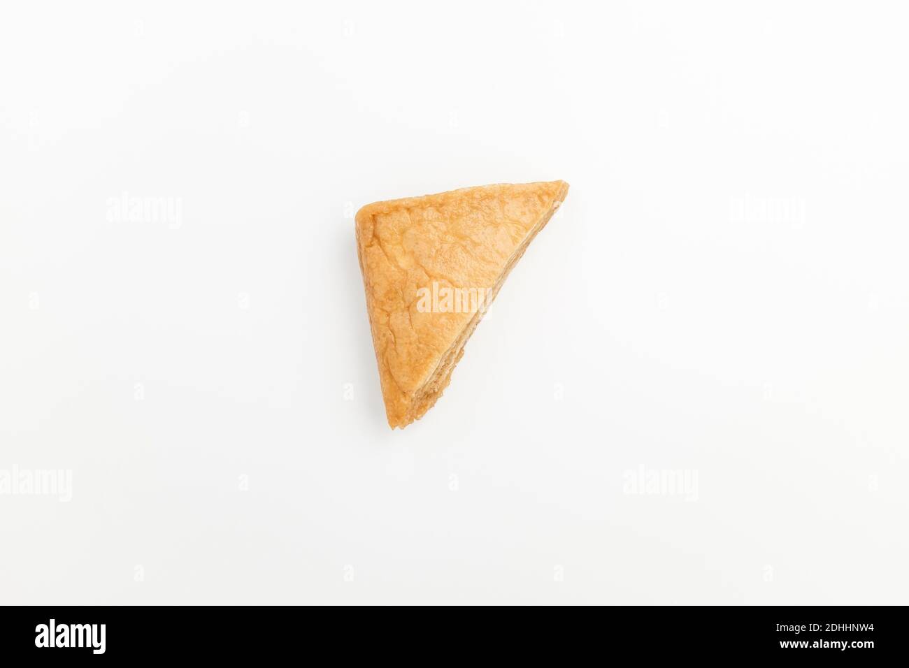 Triangle fried tofu on white background Stock Photo - Alamy