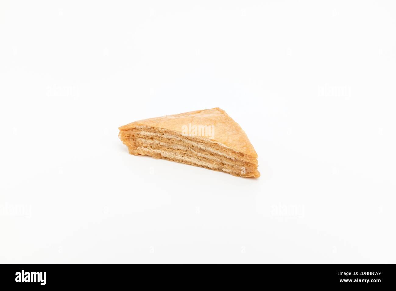 Triangle fried tofu on white background Stock Photo - Alamy