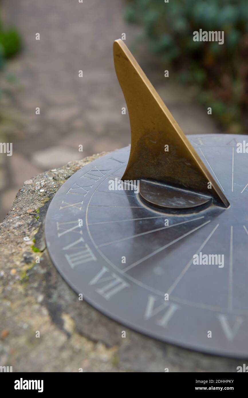 Sundial with Roman Numerals ion Stone Plinth Stock Photo - Alamy