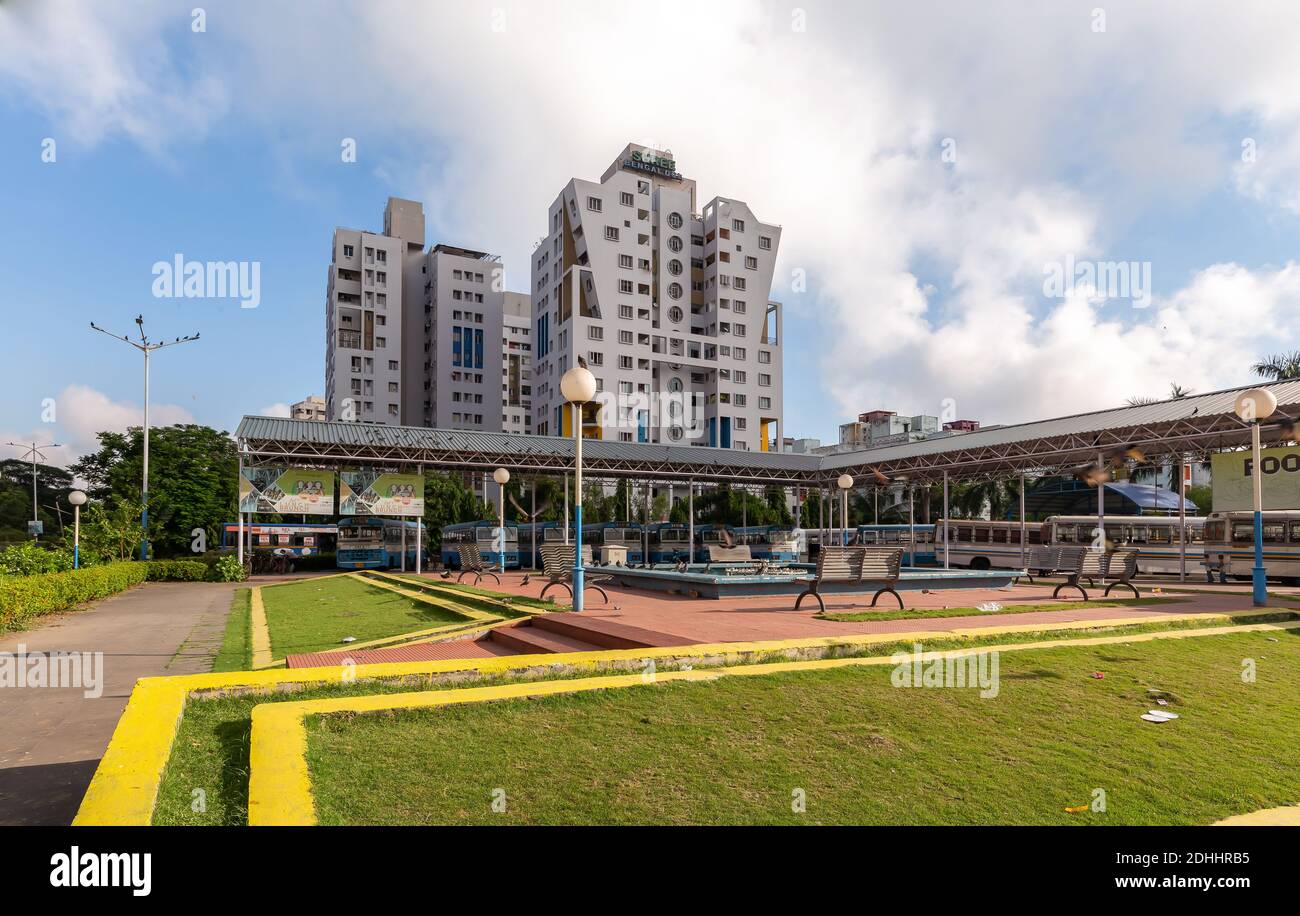 Public transport bus depot with city residential buildings at New Town ...