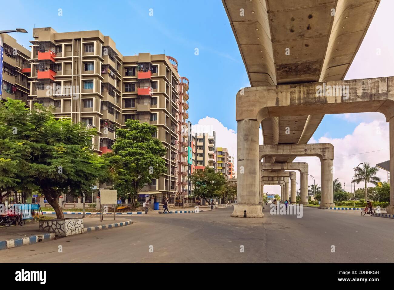 City under construction flyover with residential buildings at New Town ...