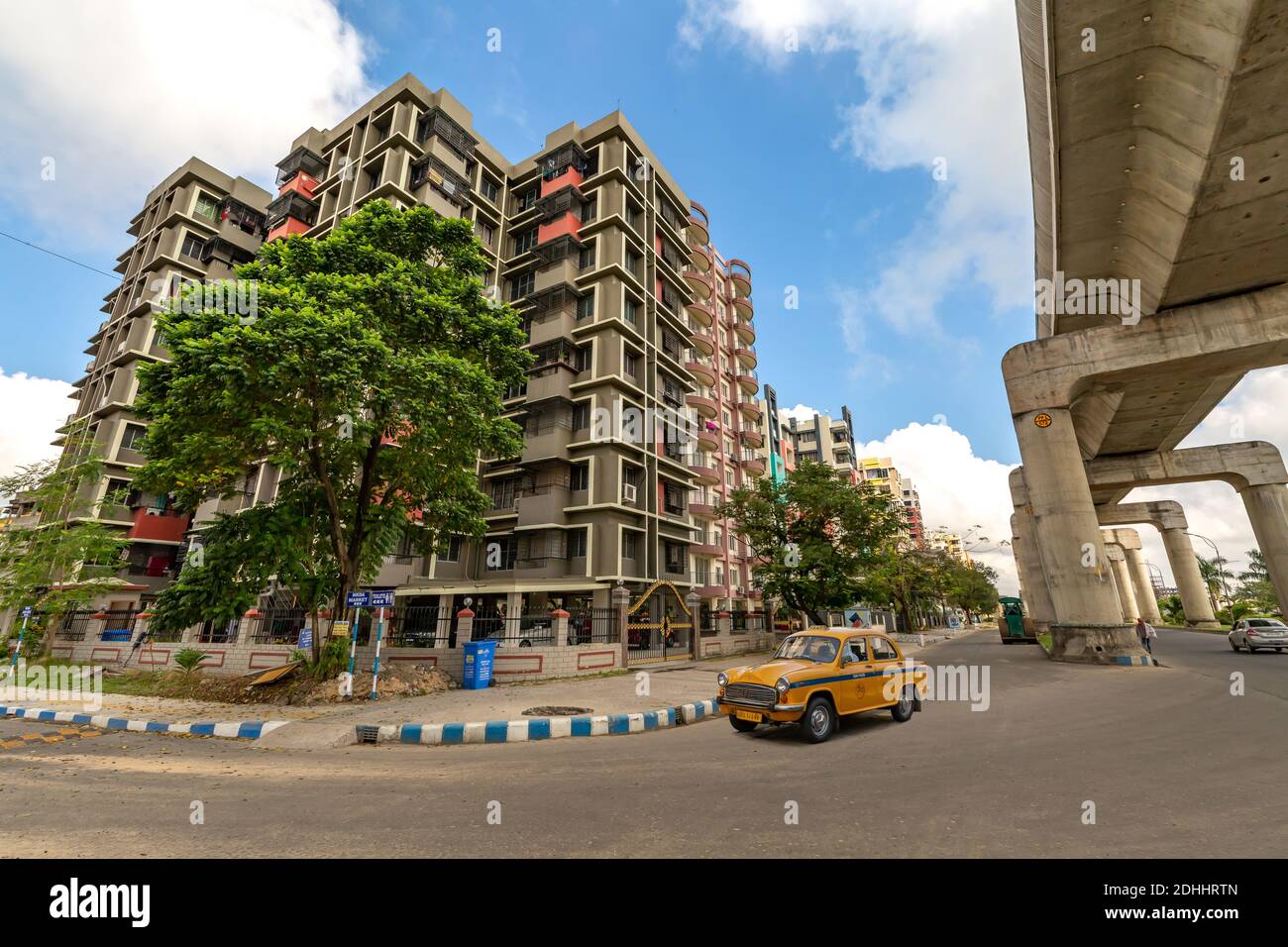 City under construction flyover with residential buildings at New Town ...
