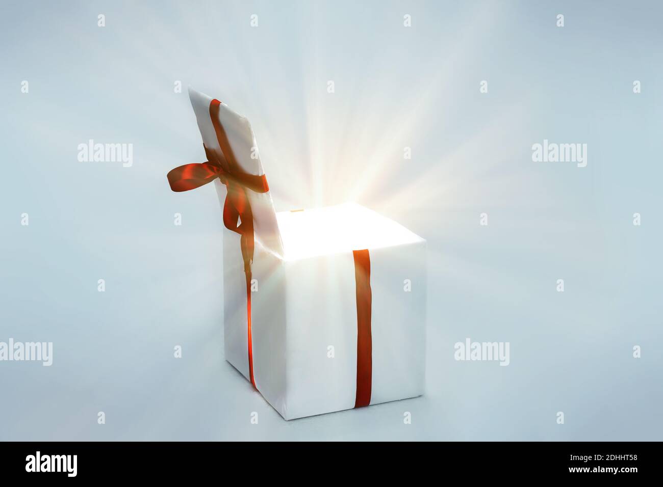 open gift box with ribbon isolated on white Stock Photo - Alamy