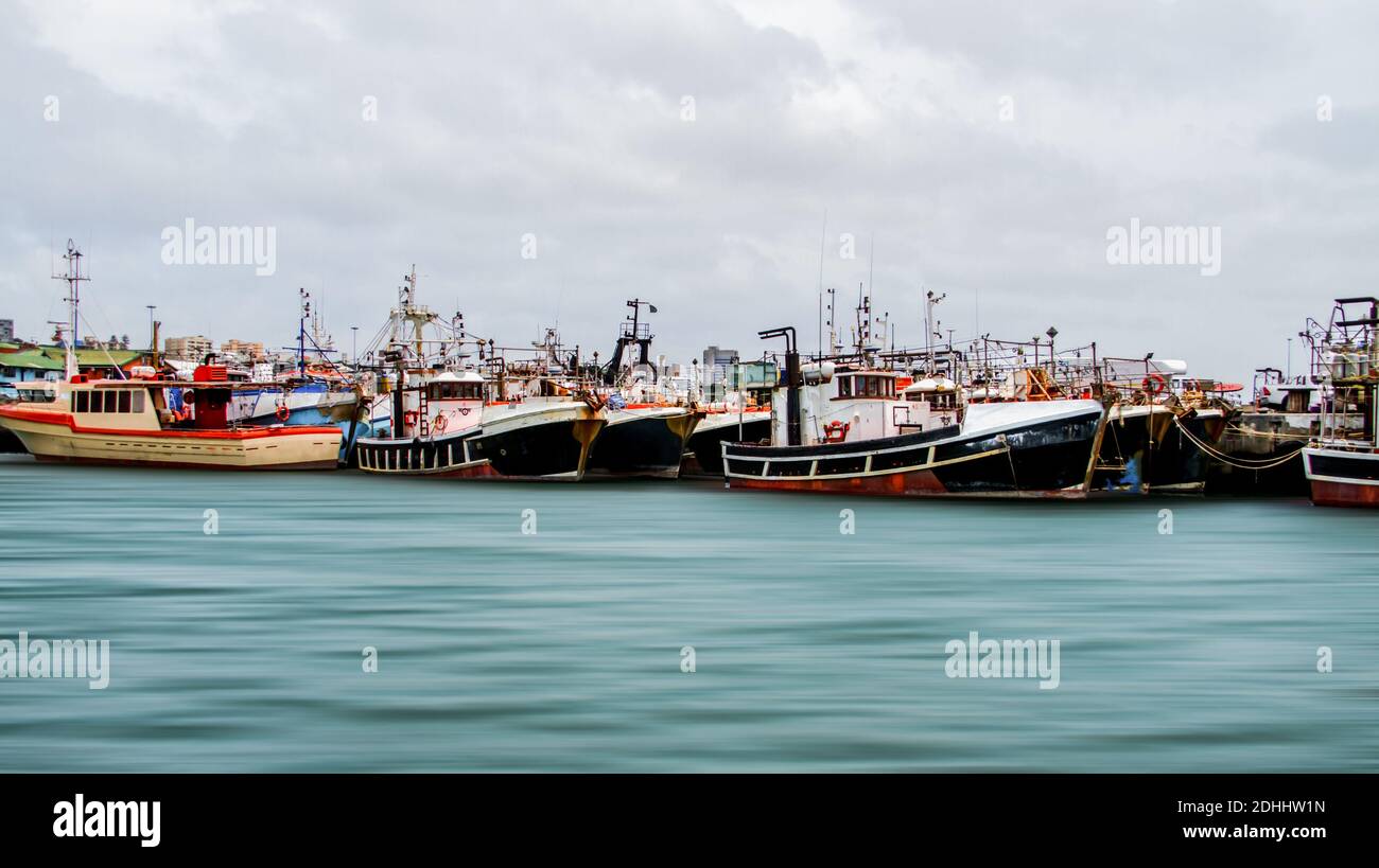 PORT ELIZABETH, SOUTH AFRICA - Nov 25, 2020: Blur of fishing trawlers ...
