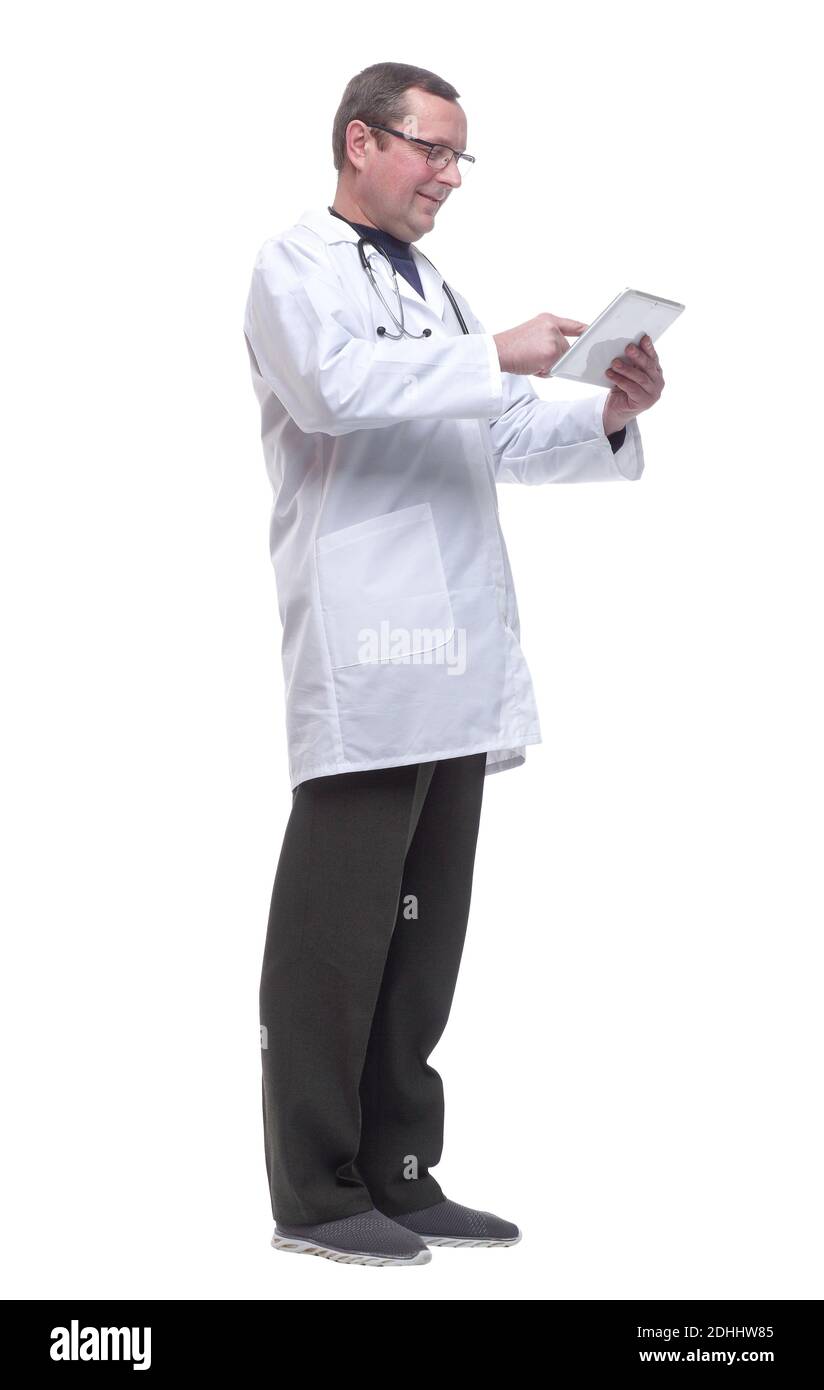 side view. doctor with a stethoscope using a digital tablet Stock Photo ...