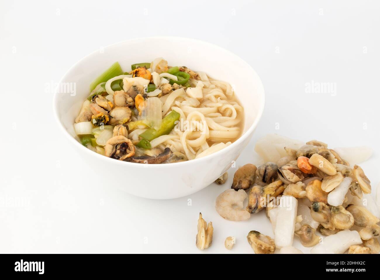 Seafood kalguksu on white background Stock Photo - Alamy