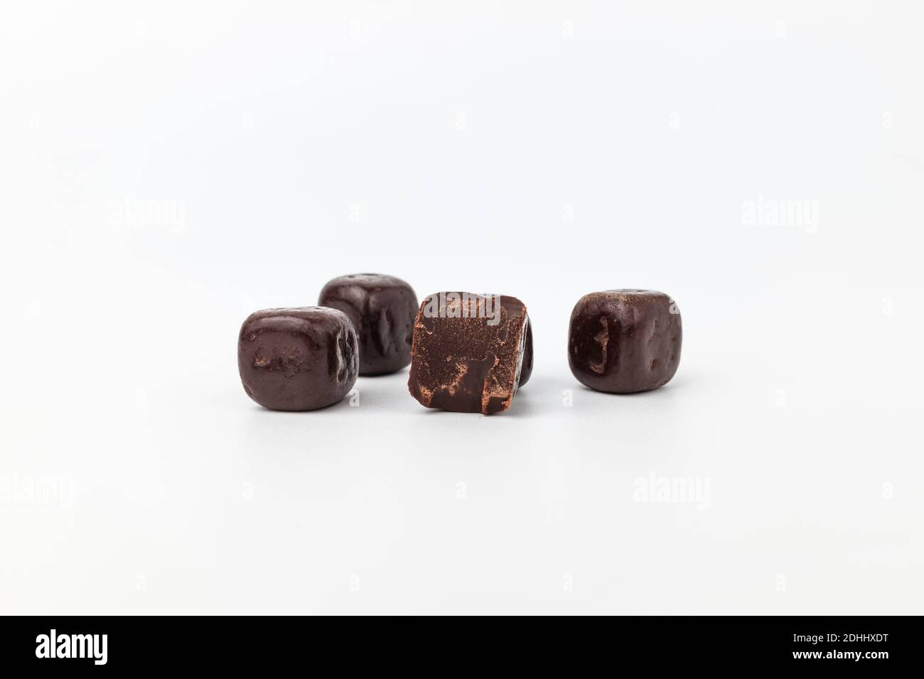 Cube chocolate on white background Stock Photo - Alamy