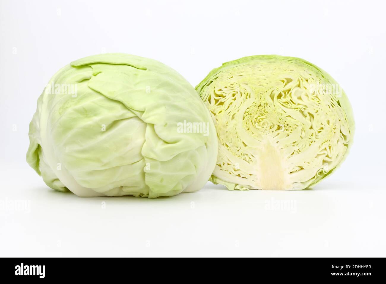 Raw cabbage on white background Stock Photo - Alamy