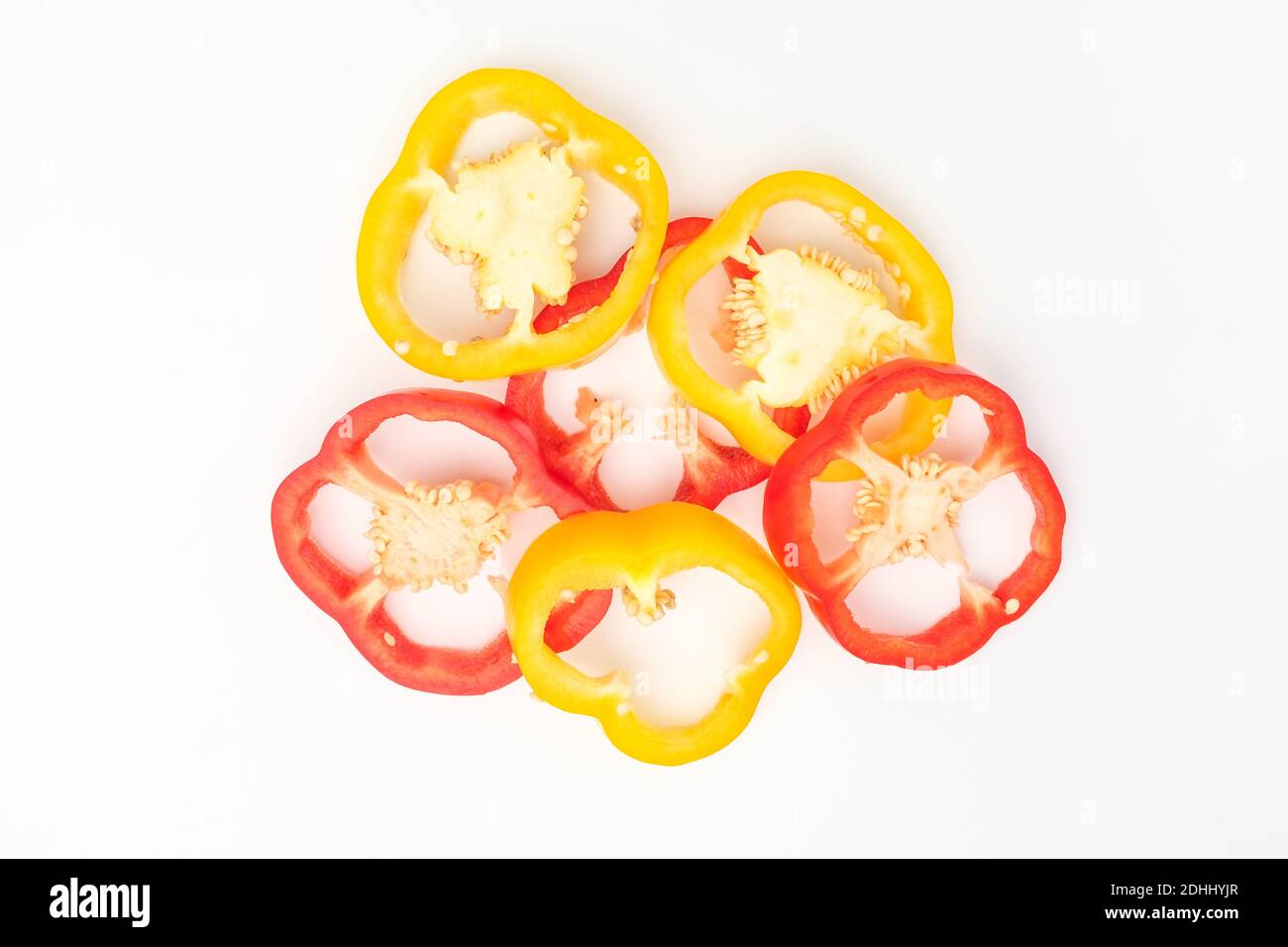 Colored paprika on white background Stock Photo - Alamy