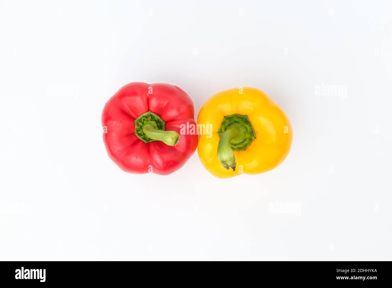 Colored paprika on white background Stock Photo - Alamy