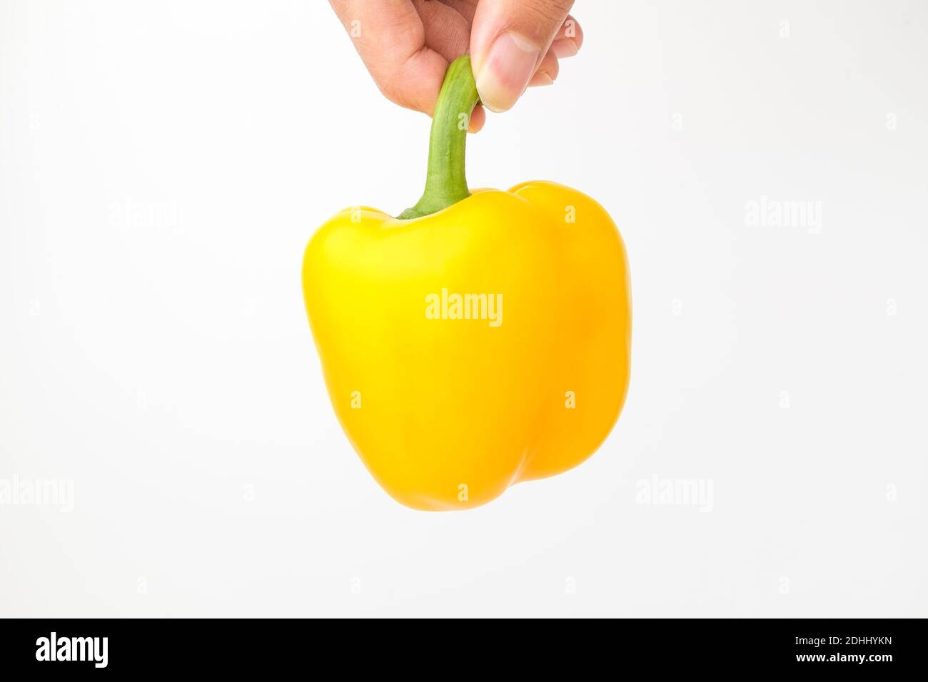 Colored paprika on white background Stock Photo - Alamy