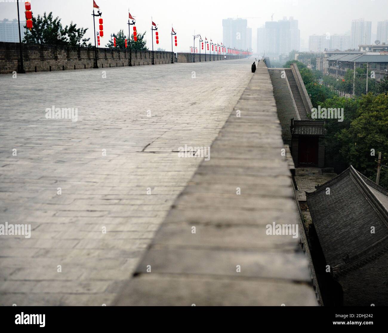 Pedestrian sidewalk on top of fortification city walls in Xian, Chinese ...