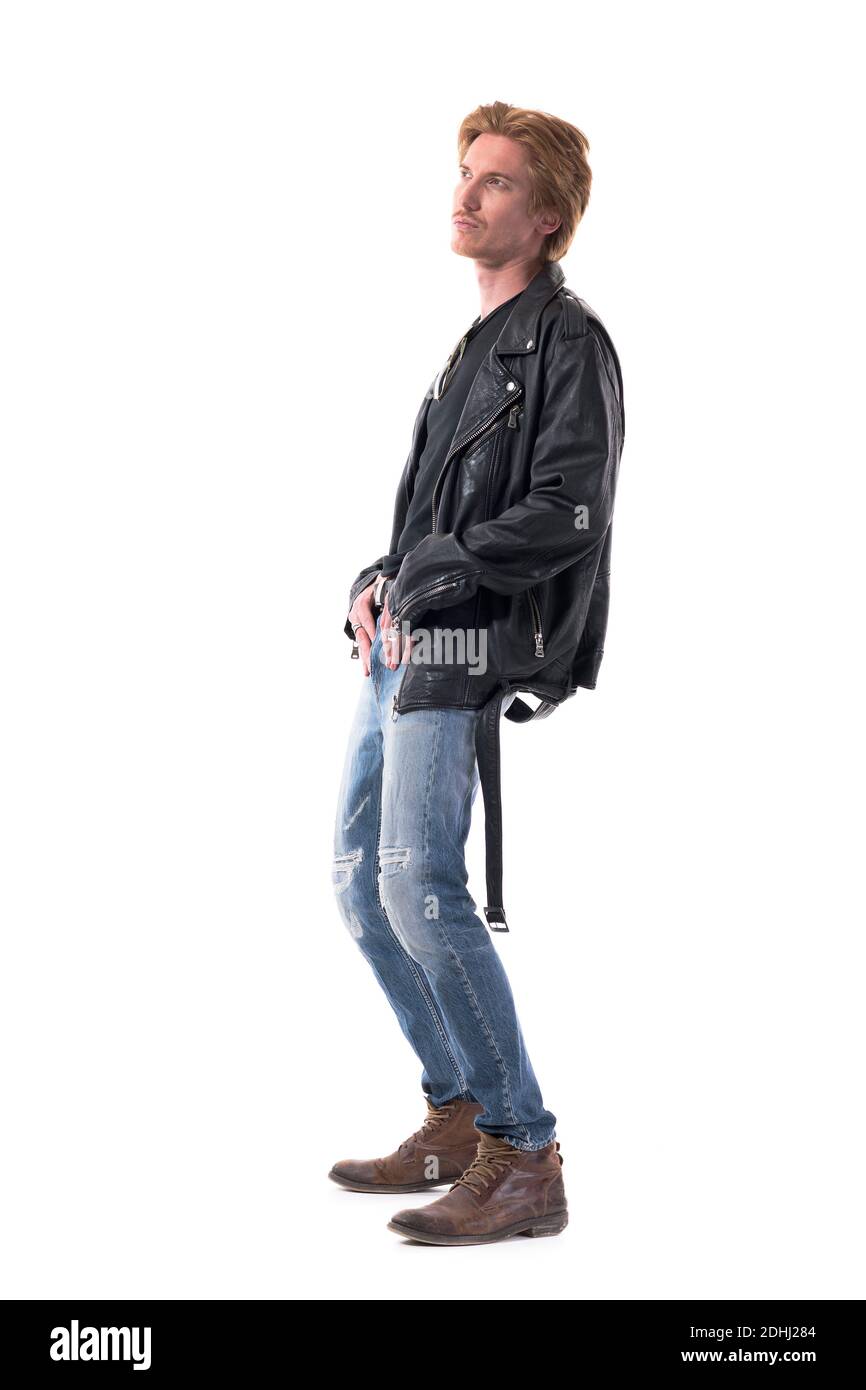 Side view of stylish handsome redhead man in biker leather jacket ...