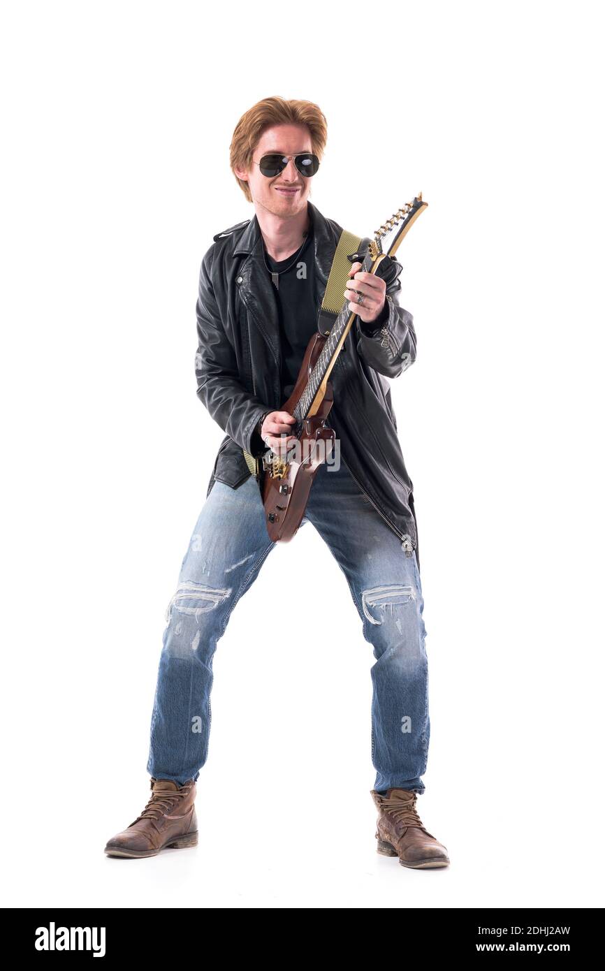 Happy passionate skillful rock guitarist playing electric guitar having ...