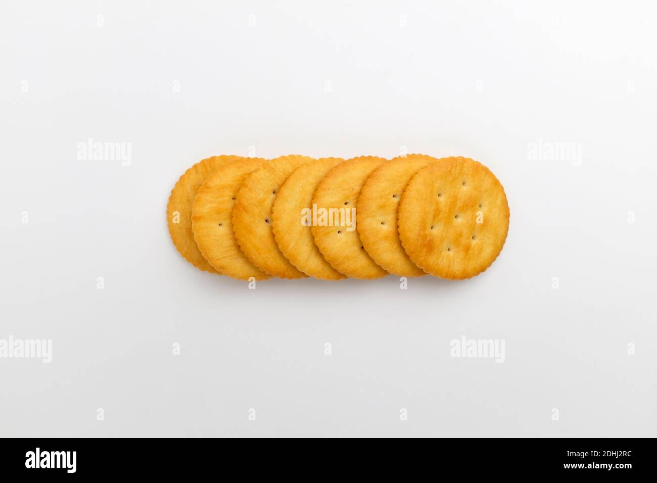 Round and yellow biscuits with background Stock Photo - Alamy