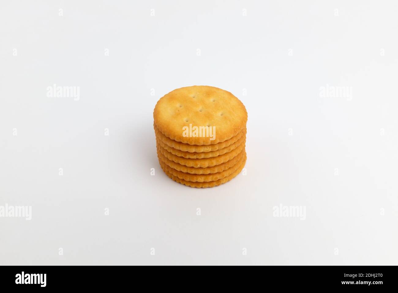 Round and yellow biscuits with background Stock Photo - Alamy